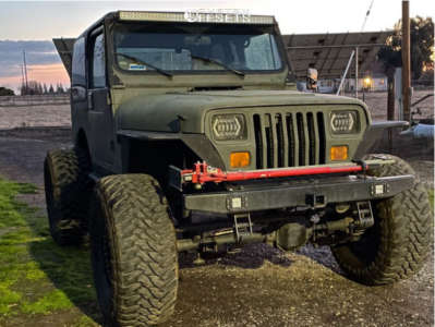 1995 Jeep Wrangler with 15x10 -47 Pro Comp Series 69 and 33/12.5R15 ...