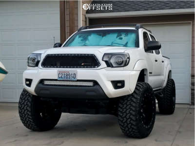 2014 Toyota Tacoma with 20x12 -44 Ballistic Rage and 33/12.5R20 ...