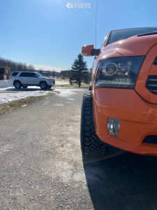 2017 Ram 1500 with 20x12 -51 Vision Rocker and 33/10.5R20 Nitto Ridge ...