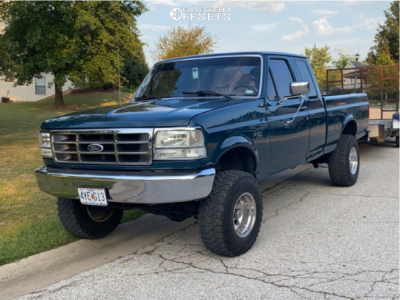 1995 Ford F-150 with 15x10 -41 Pro Comp Series 69 and 32/11.5R15 RBP ...