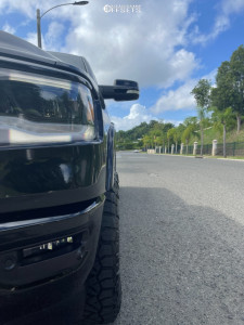 2019 Ram 1500 with 18x9 20 Fuel Torque and 295/70R18 Nitto Ridge ...
