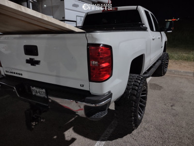 2015 Chevrolet Silverado 2500 HD with 20x12 -44 TIS 554BM and 35/12 ...