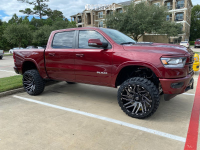 2020 Ram 1500 with 24x12 -44 TIS 554BM and 35/12.5R24 Gladiator Xcomp ...