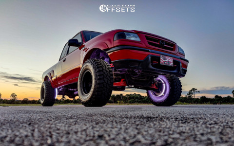 2001 Mazda B3000 with 15x10 -47 Pro Comp 69 and 33/12.5R15 Mastercraft ...