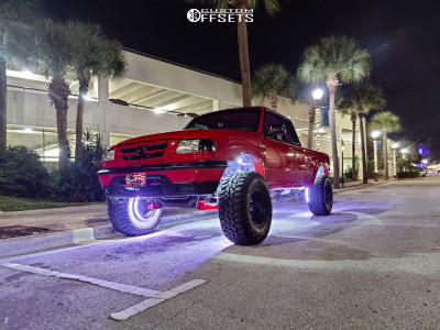 2001 Mazda B3000 with 15x10 -47 Pro Comp 69 and 33/12.5R15 Mastercraft ...