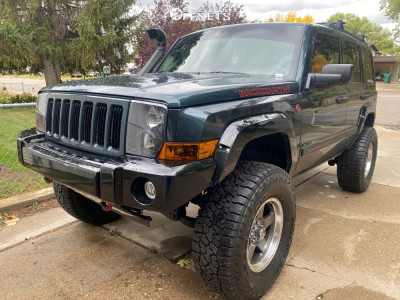 2006 Jeep Commander with 17x8.5 18 Level 8 Punch and 35/12.5R17 Falken ...