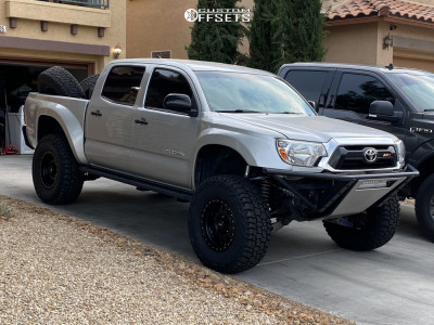 2012 Toyota Tacoma with 17x8.5 0 Vision Manx and 315/11.5R17 Mickey ...