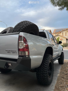 2012 Toyota Tacoma with 17x8.5 0 Vision Manx and 315/11.5R17 Mickey ...