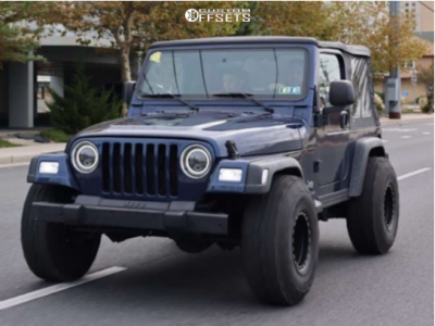 2005 Jeep Wrangler with 15x10 -44 Pro Comp Series 252 and 33/10.5R15 ...