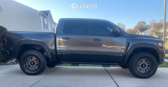 2021 Ram 1500 with 18x9.5 10 Vision Rocker and 35/12.5R18 Goodyear All ...
