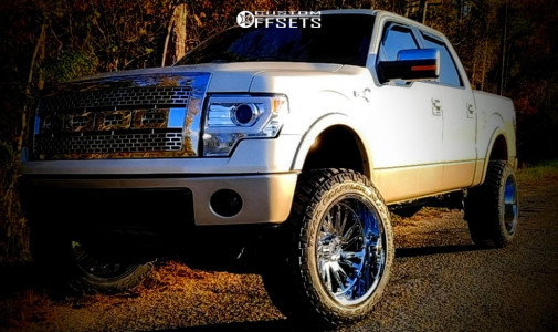 2009 Ford F-150 with 22x12 -45 Tuff T2a and 35/12.5R22 Nitto Recon ...