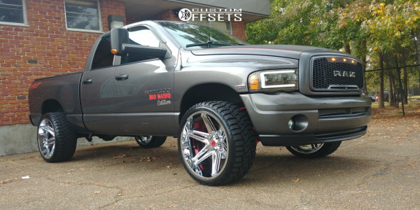 2003 Dodge Ram 1500 with 24x12 -51 Vision Razor and 33/12.5R24 Haida ...