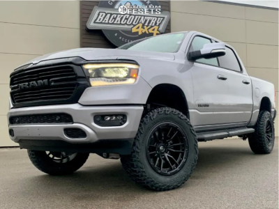 2022 Ram 1500 with 20x10 -18 Fuel Rebel and 35/12.5R20 Mickey Thompson ...