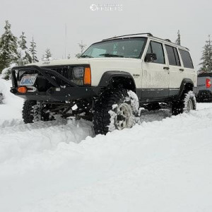 1996 Jeep Cherokee with 15x8 4.5 MB Wheels Razor and 33/12.5R15 Mickey ...