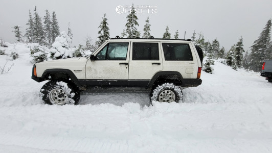 1996 Jeep Cherokee with 15x8 4.5 MB Wheels Razor and 33/12.5R15 Mickey ...