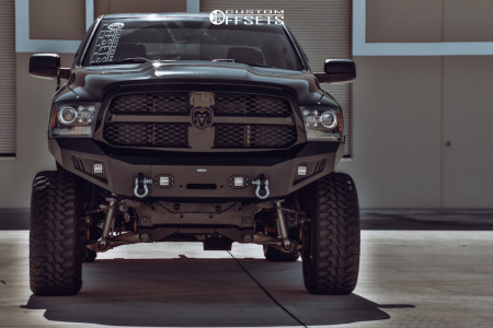 2014 Ram 1500 with 20x10 -24 Wicked Offroad W909 and 35/12.5R20 Radar ...