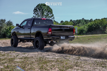 2014 Ram 1500 with 20x10 -24 Wicked Offroad W909 and 35/12.5R20 Radar ...