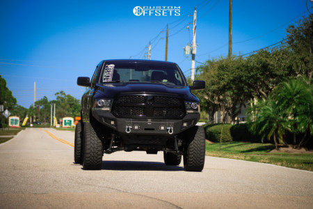 2014 Ram 1500 with 20x10 -24 Wicked Offroad W909 and 35/12.5R20 Radar ...
