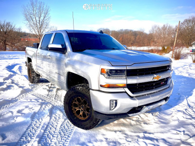 2017 Chevrolet Silverado 1500 with 18x9 -12 Weld Off-Road Ledge and 275 ...