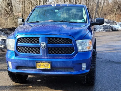 2015 Ram 1500 with 20x10 -18 Grid Gd01 and 35/12.5R20 Radar Renegade Rt ...
