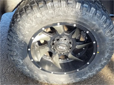 2015 Ram 1500 with 20x10 -18 Grid Gd01 and 35/12.5R20 Radar Renegade Rt ...
