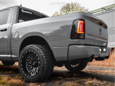 2015 Ram 1500 with 20x12 -44 TIS 553BM and 33/12.5R20 Toyo Tires Open ...