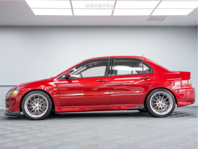 2003 Mitsubishi Lancer with 18x9.5 27 Enkei Nt03m and 265/35R18 Nitto ...