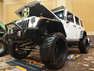 2012 Jeep Wrangler with 24x12 -51 Vision Rocker 412 and 37/13.5R24 AMP ...