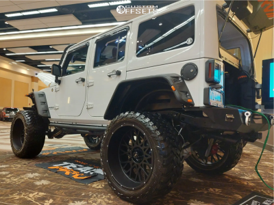 2012 Jeep Wrangler with 24x12 -51 Vision Rocker 412 and 37/13.5R24 AMP ...