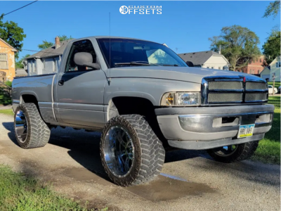 2000 Dodge Ram 1500 with 22x14 -76 XD XD809 Riot and 355/40R22 Nitto ...