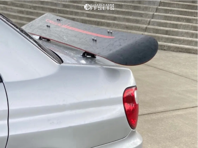 2004 Subaru Impreza with 16x7 48 Vision Cross and 205/55R16 Michelin ...