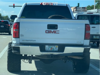 2017 GMC Sierra 1500 with 22x12 -44 Hostile Alpha and 33/14.5R22 AMP Mud Terrain Attack Mt A and ...