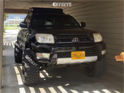 2004 Toyota 4Runner with 24x12 -44 TIS 547BM and 33/12.5R24 Comforser ...