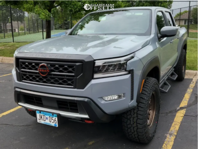 2022 Nissan Frontier with 17x8 0 Black Rhino Aliso and 285/70R17 Falken ...