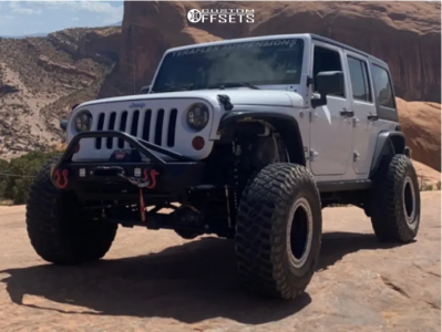 2012 Jeep Wrangler with 17x8.5 KMC Km235 and 37/12.5R17 BFGoodrich Mud ...