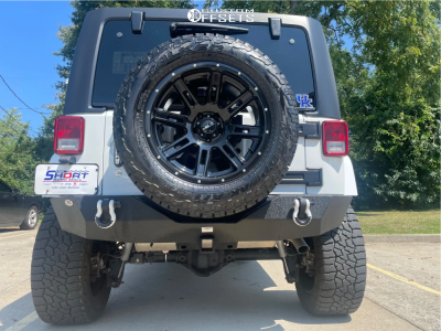 2017 Jeep Wrangler with 20x10 -24 Helo He900 and 305/55R20 Falken ...