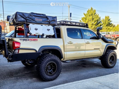 2017 Toyota Tacoma with 17x9 -44 Method Mr106 and 315/70R17 Cooper ...