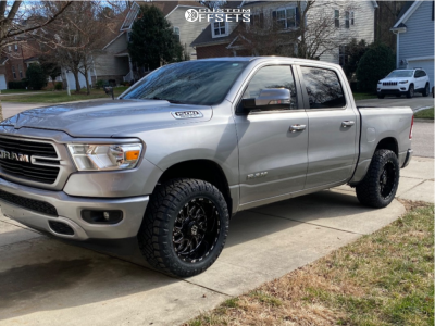 2021 Ram 1500 with 20x10 -25 TIS 544bm and 33/12.5R20 Nitto Ridge ...