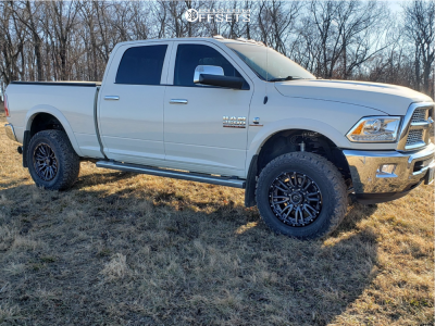 2018 Ram 2500 with 20x9 1 Fuel Rebel 8 and 35/12.5R20 Cooper Discoverer ...