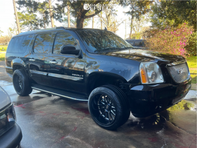 2007 GMC Yukon XL 1500 with 22x12 -51 Cali Offroad Summit and 285/45R22 ...