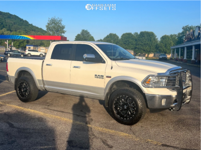2016 Ram 1500 with 20x10 -25 TIS 544bm and 275/65R20 Goodyear Wrangler ...
