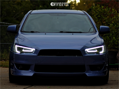 2010 Mitsubishi Lancer with 18x9.5 35 AVID1 AV42 and 245/40R18 Vercelli ...