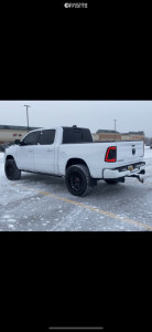 2021 Ram 1500 with 22x10 -19 TIS 554BM and 35/12.5R22 Toyo Tires Open ...