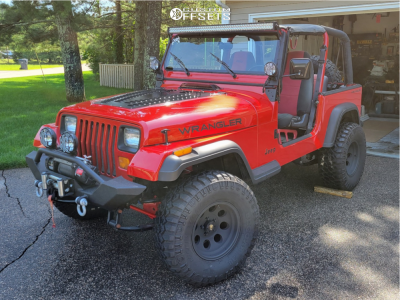 1995 Jeep Wrangler with 15x10 -47 Pro Comp Series 69 and 33/12.5R15 ...