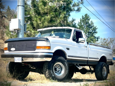 1996 Ford F-150 with 15x10 1 American Racing Bullet Hole and 33/12.5R15 ...