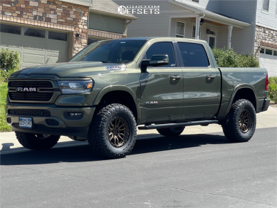2021 Ram 1500 with 18x9 -12 Fuel Rebel 6 and 325/65R18 Goodyear Wrangler Duratrac and Suspension ...