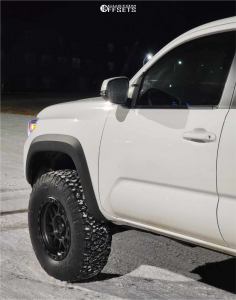 2023 Toyota Tacoma with 17x8.5 0 KMC Km544 and 285/70R17 Maxxis Razr AT ...