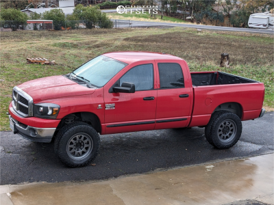 2006 Dodge Ram 2500 with 20x9 18 Method Mr316 and 35/12.5R20 Cooper ...