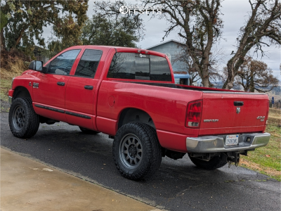 2006 Dodge Ram 2500 with 20x9 18 Method Mr316 and 35/12.5R20 Cooper ...