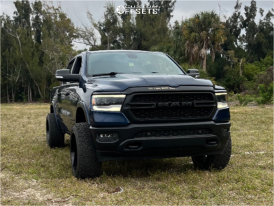2020 Ram 1500 with 22x12 -44 TIS 547bm and 33/12.5R22 Venom Power Terra ...